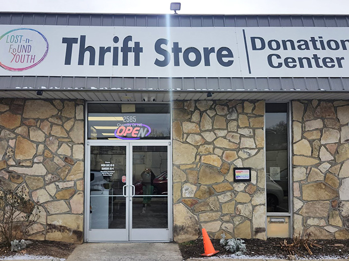 Behind that stone facade and neon "OPEN" sign, Lost-N-Found Youth Thrift Store houses treasures with purpose.