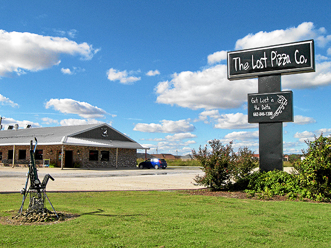 The Lost Pizza Co. sign stands tall against Mississippi skies. Getting "lost" never tasted so delicious!