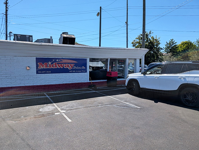 Classic Americana lives at Midway Drive-In, where the hot dogs are as timeless as the setting.