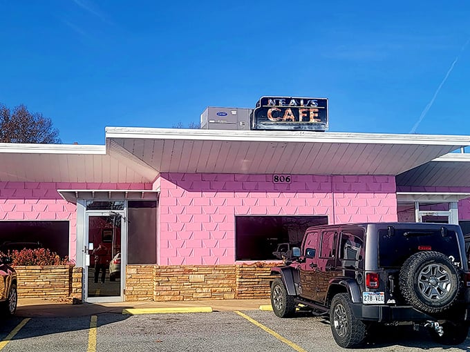 Neal's Caf&eacute;'s unmistakable pink exterior stands out like a delicious beacon of fried chicken hope on Thompson Street.