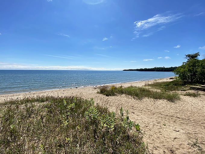 Beach therapy, Wisconsin-style! Lake Michigan's shores offer Caribbean vibes without the passport hassle or tourist prices.
