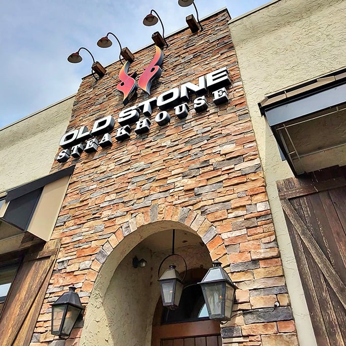 Old Stone's rustic stone facade and dramatic lighting create the perfect prelude to steak perfection.
