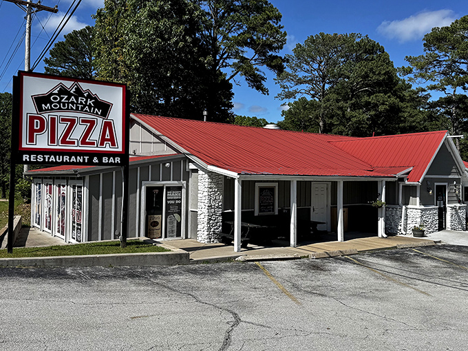Ozark Mountain Pizza's rustic charm matches its Branson setting perfectly. That red roof has sheltered countless pizza memories.