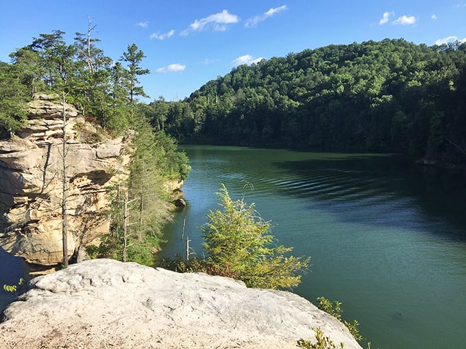 Paintsville Lake's forested shores create a wilderness escape, with each bend in the trail revealing new mountain vistas.