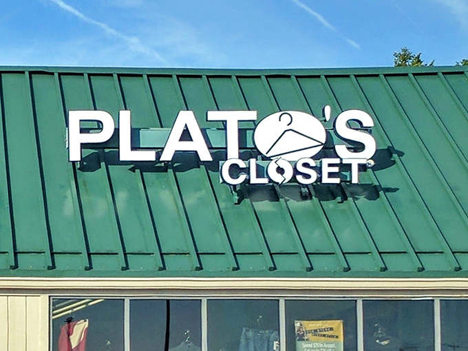 Clean green roofing and bright signage make this trendy consignment spot look fresh and inviting.