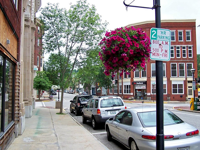 That hanging flower basket add a touch of beauty to Rumford's practical downtown, where affordability meets New England character.