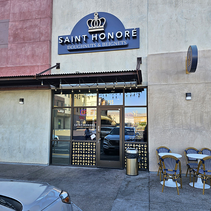 French sophistication meets Vegas indulgence! Saint Honor&eacute;'s crown-topped signage and bistro seating promise a pastry experience worthy of Marie Antoinette herself.