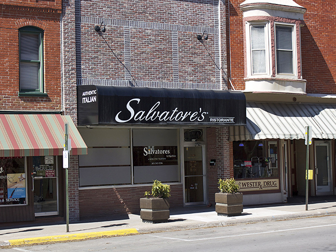 Salvatore's elegant black awning offers a touch of sophistication. Behind that modest storefront, Italian magic happens daily.