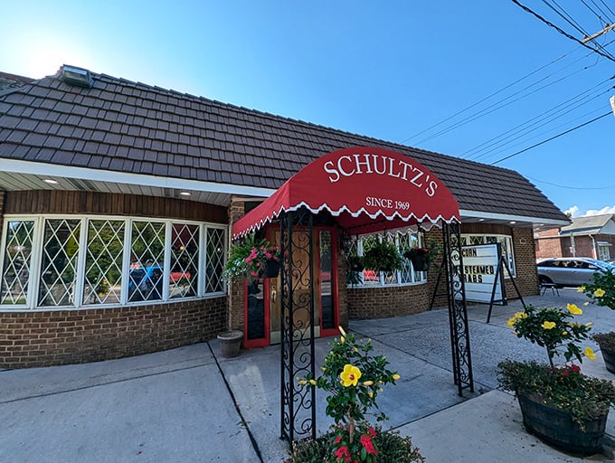 Schultz's red sign has been guiding hungry seafood lovers since 1969. Those flower barrels add a homey touch to this crab paradise.