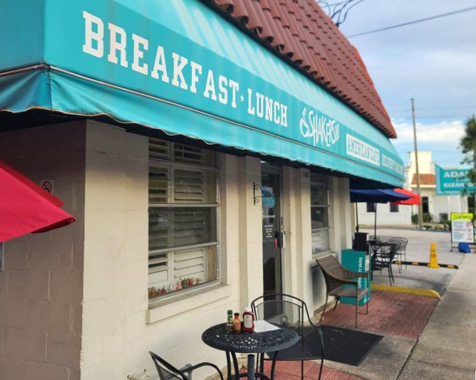 Shakers American Cafe: That turquoise awning is like a beacon of breakfast hope on a street full of ordinary options.