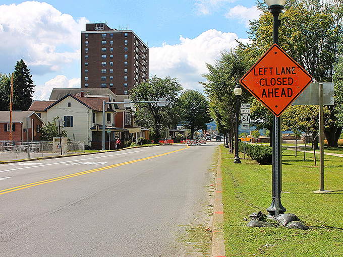 That orange construction sign might as well read "Welcome to Your New Affordable Adventure."