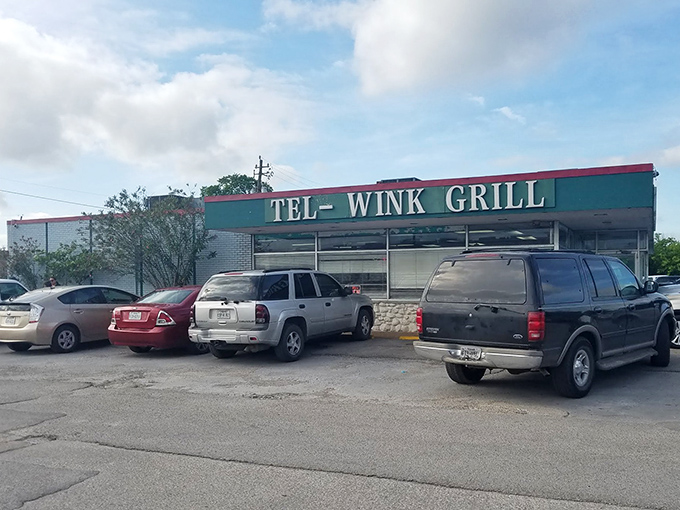 Tel-Wink Grill's turquoise facade stands out like a diner oasis. No frills, just fantastic food that keeps the parking lot full.