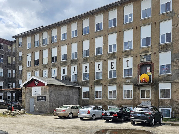The Old Mill's imposing stone facade tells stories of industrial history while housing today's vintage treasures.