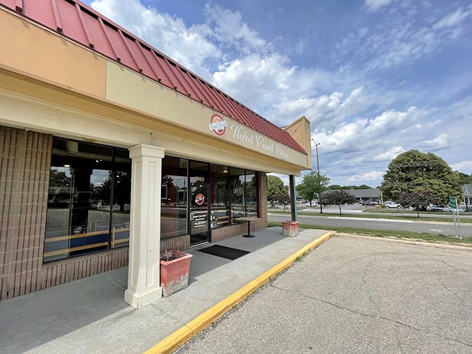 Strip mall magic happens when passionate pizza makers transform humble spaces into culinary destinations.