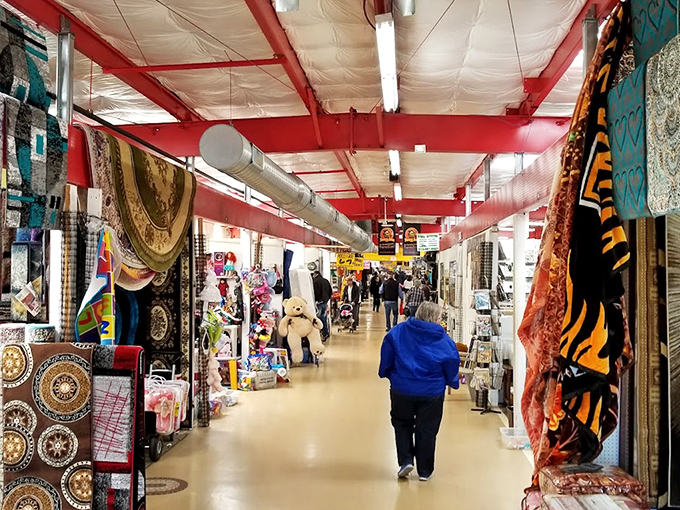 Colorful tapestries hang like flags in this treasure-seeker's paradise, creating corridors of possibility in every direction.