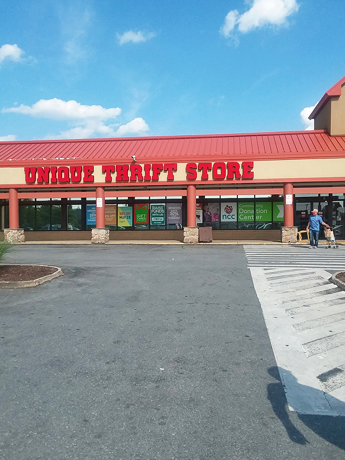 Unique Thrift Store announces itself with unmistakable red-and-yellow signage that practically shouts "bargains inside!"