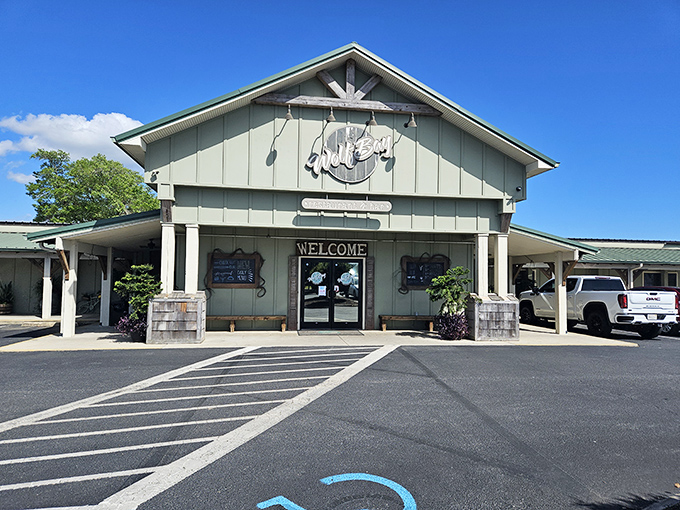 Wolf Bay Restaurant seafood-themed facade in Foley welcomes you like an old friend's beach house. Those wooden beams practically whisper "fresh catch inside!"