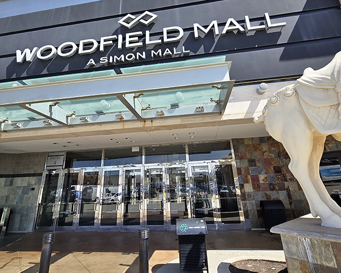 Woodfield Mall's sleek exterior houses a shopping universe so vast you might need breadcrumbs to find your way back to the entrance.