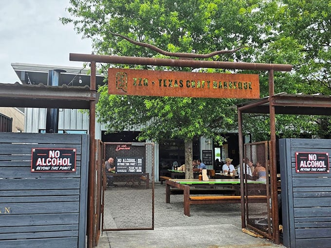 ZZQ's industrial entrance isn't just a gate&mdash;it's the threshold between ordinary life and extraordinary Texas craft BBQ.