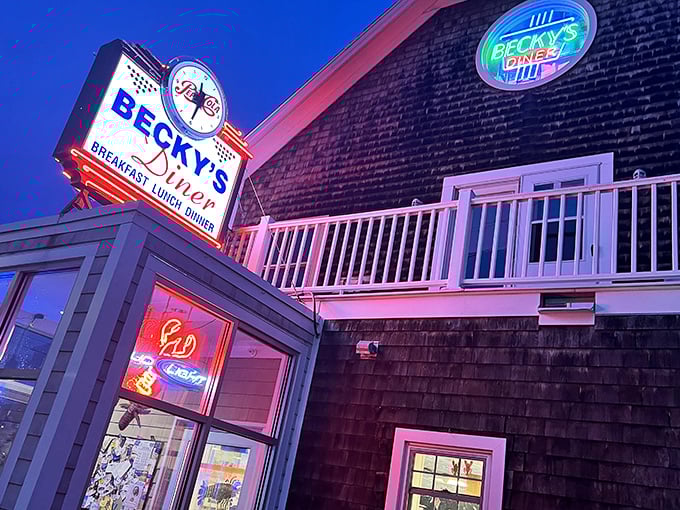 When the blue hour hits Becky's Diner, the neon transforms this shingled institution into a Edward Hopper painting with better coffee.