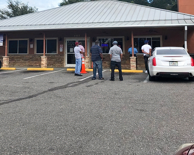 No-nonsense barbecue happens at Big John's. That line of people waiting outside tells you everything you need to know.