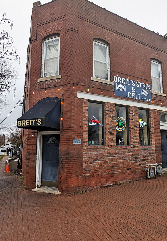 Those string lights whisper "stay awhile" while the brick walls promise authentic deli goodness within.