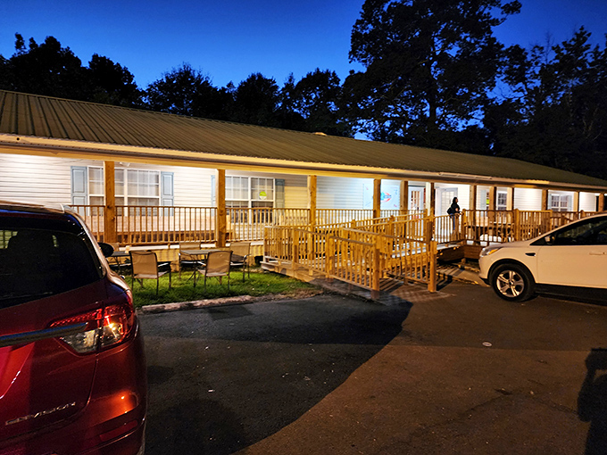 As evening falls, this humble Ville Platte eatery transforms into a glowing haven for catfish connoisseurs.