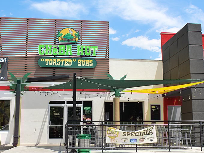 Palm trees and string lights create the perfect vibe at Cheba Hut. Sandwich paradise found!