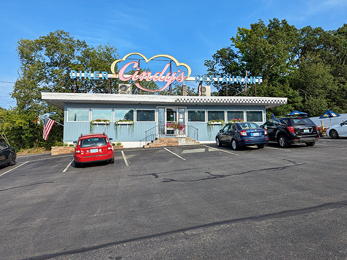 Morning light bathes Cindy's classic diner sign, promising the kind of breakfast that makes you forget all about your fancy smoothie recipes.