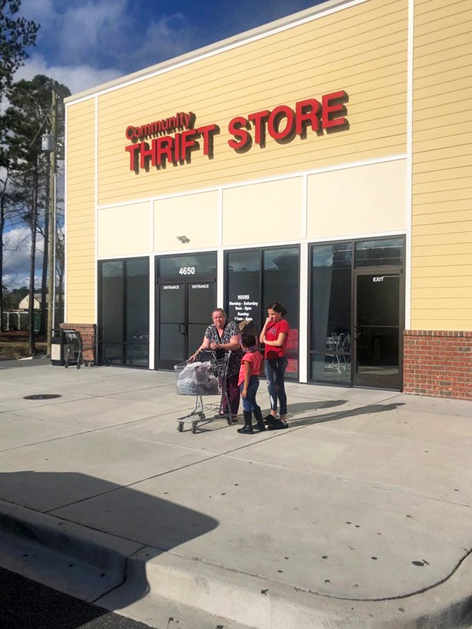 Shoppers exit with carts full of finds—proof that "community" here means sharing the wealth of wonderful deals.