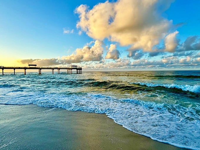 Nature's own screensaver! The pier stretches toward infinity as waves kiss the shore at Alabama Point East.