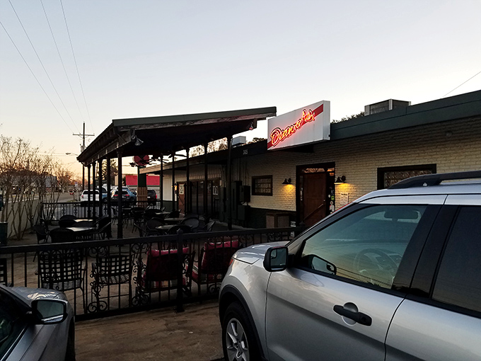 Sunset at Deano's &ndash; where pizza dreams and Louisiana evenings create the perfect pairing.
