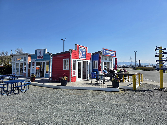 A colorful collection of seaside shacks serving up gourmet dogs – waterfront dining doesn't get more charming than this.