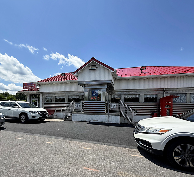 Blue skies frame this diner beauty with its eye-catching red roof and twin staircases &ndash; a symmetrical temple to home cooking.