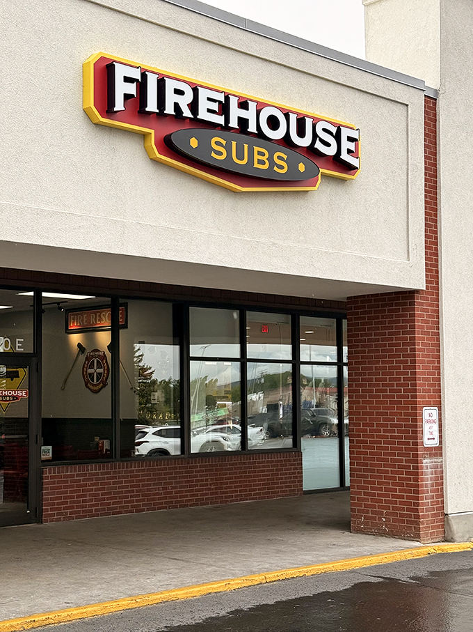 The distinctive red and yellow Firehouse Subs logo promises the same steamy, satisfying subs that have won hearts nationwide.