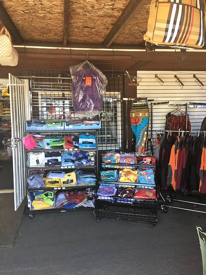 Colorful clothing and neatly arranged merchandise create a shopper's paradise in this covered market. Fashion finds without department store prices—now that's retail therapy done right!