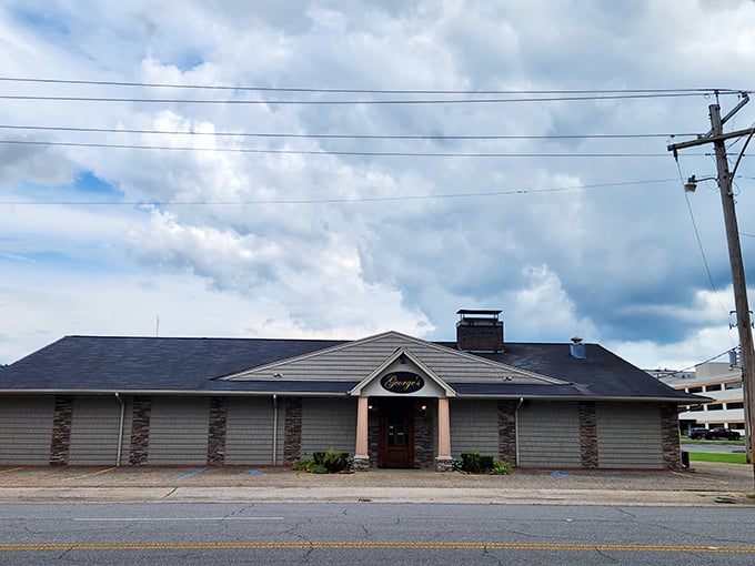 Stone, wood, and the promise of hickory-smoked perfection. George's exterior hints at the timeless dining experience within.