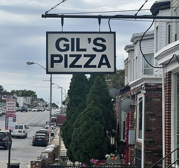 This corner spot proves that the best pizza joints often hide behind the most unassuming facades. 