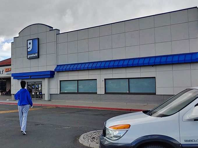 Even cloudy days can't dim the thrill of the hunt at Goodwill's Reno outpost, where blue-trimmed entrances lead to unexpected treasures.