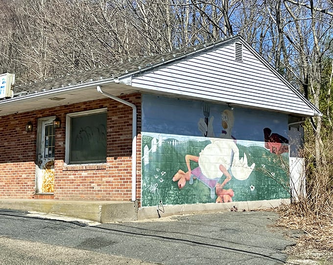 The whimsical chicken mural outside Greer's hints at the playful deliciousness waiting inside this humble spot.