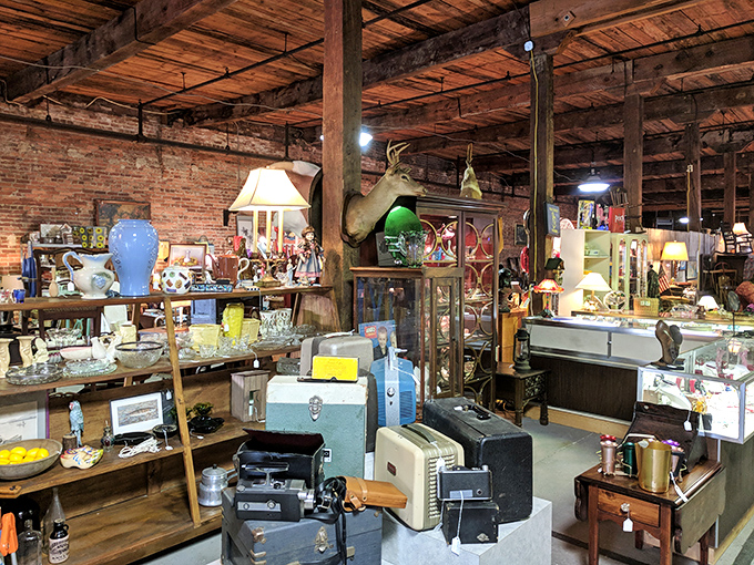 Exposed brick and wooden beams create the perfect backdrop for history on display. Like a museum where everything's for sale!
