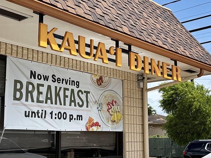 The sign proudly announces breakfast until 1 pm, because some mornings deserve to stretch well into the afternoon.