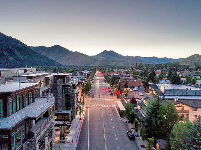 Sunset casts a golden glow over Ketchum's downtown, where Ernest Hemingway found inspiration in these mountain-rimmed streets.