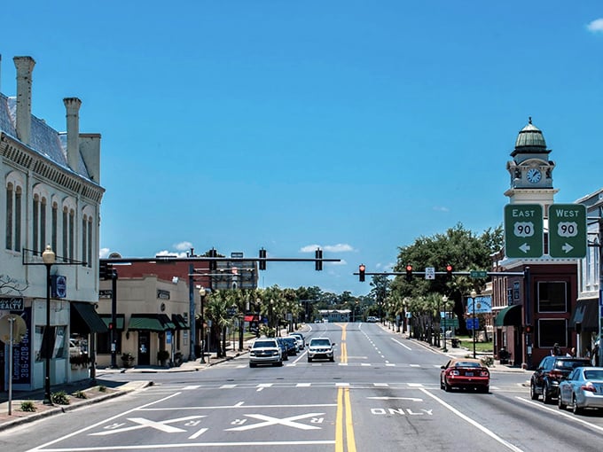 Live Oak's bustling streets reveals a charming small town where the clock tower stands as a landmark amid the tree-covered landscape.