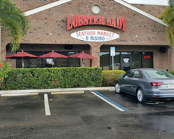Brick buildings and red awnings create an inviting backdrop for fresh seafood adventures.