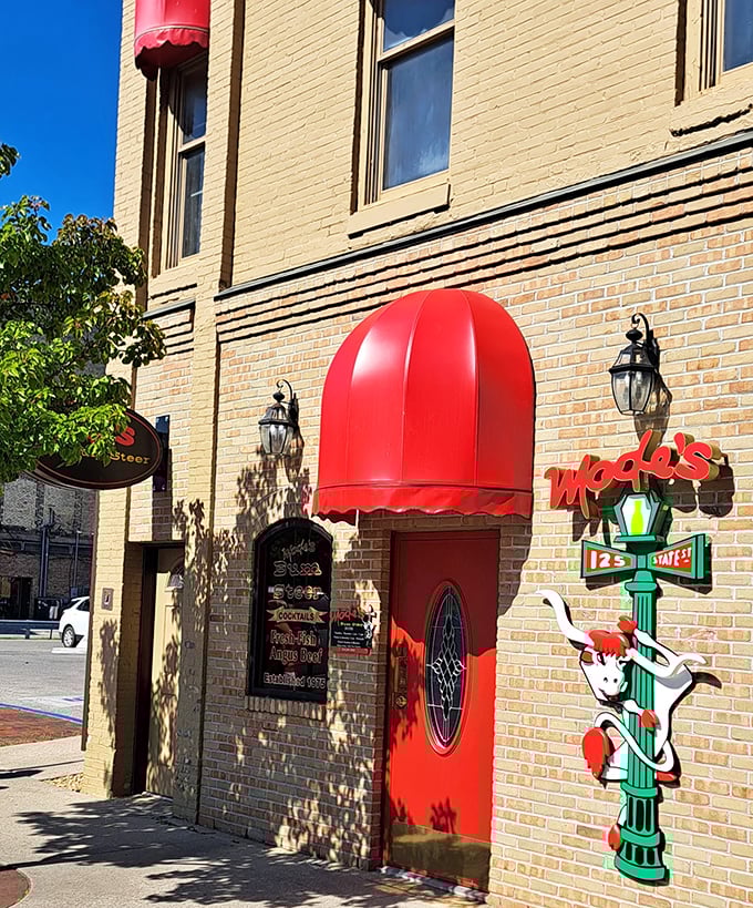 The whimsical cow sign and classic brick facade of Modes Bum Steer hide a serious commitment to perfect steaks since 1975.