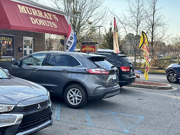 When the parking lot stays this packed, you've found a community gathering spot disguised as a donut shop.