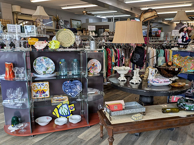 Crystal glassware gleams alongside vintage china&mdash;proof that secondhand shopping can still feel first-class.