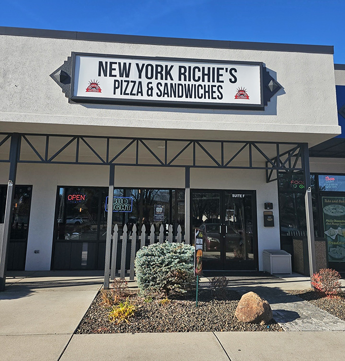 The white picket fence outside Richie's is like the pizza equivalent of a welcome mat&mdash;come in, we've got what you need.