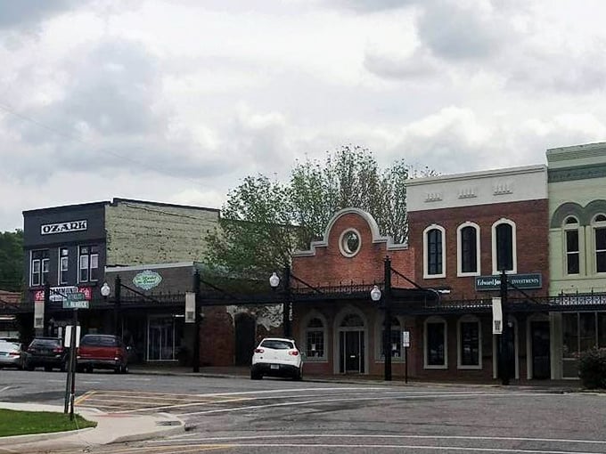 These Ozark buildings huddle together like old friends sharing secrets, their weathered faces telling tales of decades gone by.